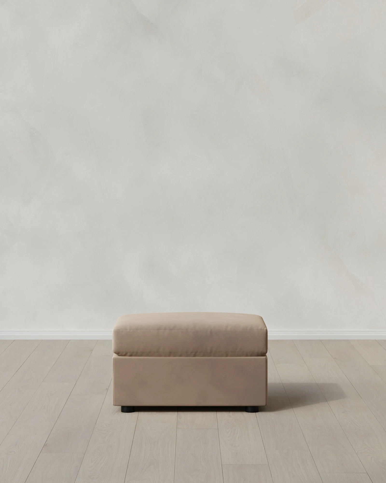 Brennan Performance Velvet Ottoman in Caramel